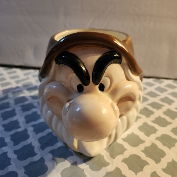 The Walt Disney Company | Dining | Grumpy Mug The Walt Disney Company ...